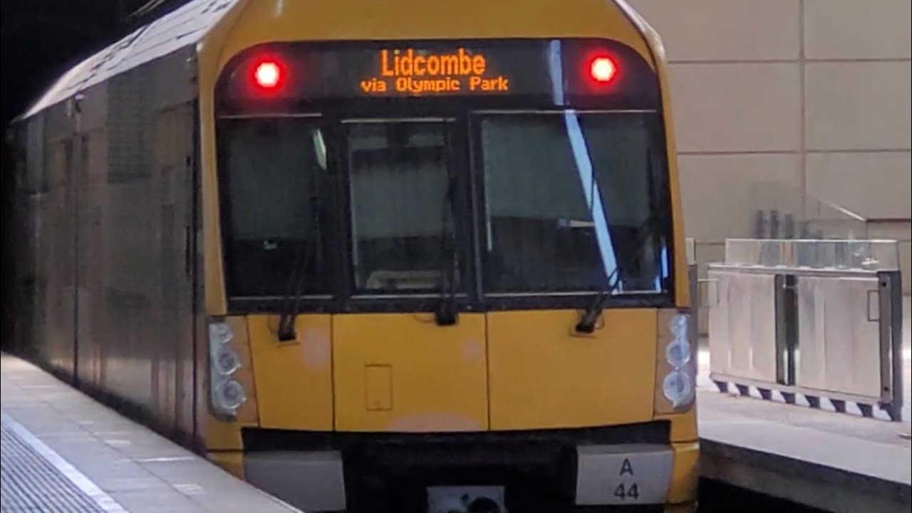 Sydney Trains Waratah A set train arriving and departing Olympic Park ...