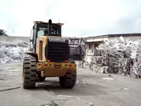 Loader Rehandling Alumimum Bale at a Recycling Plant - YouTube