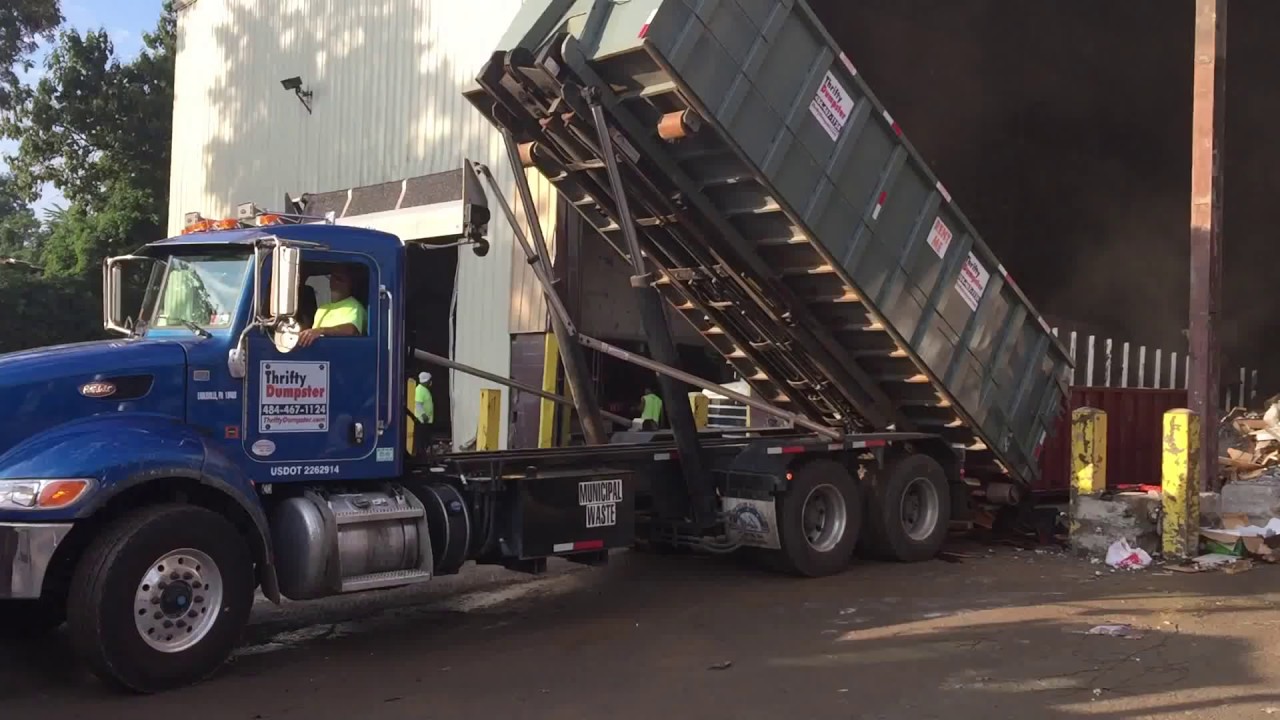 Thrifty Dumpster at Transfer Station Dumping a load of shingles to be ...