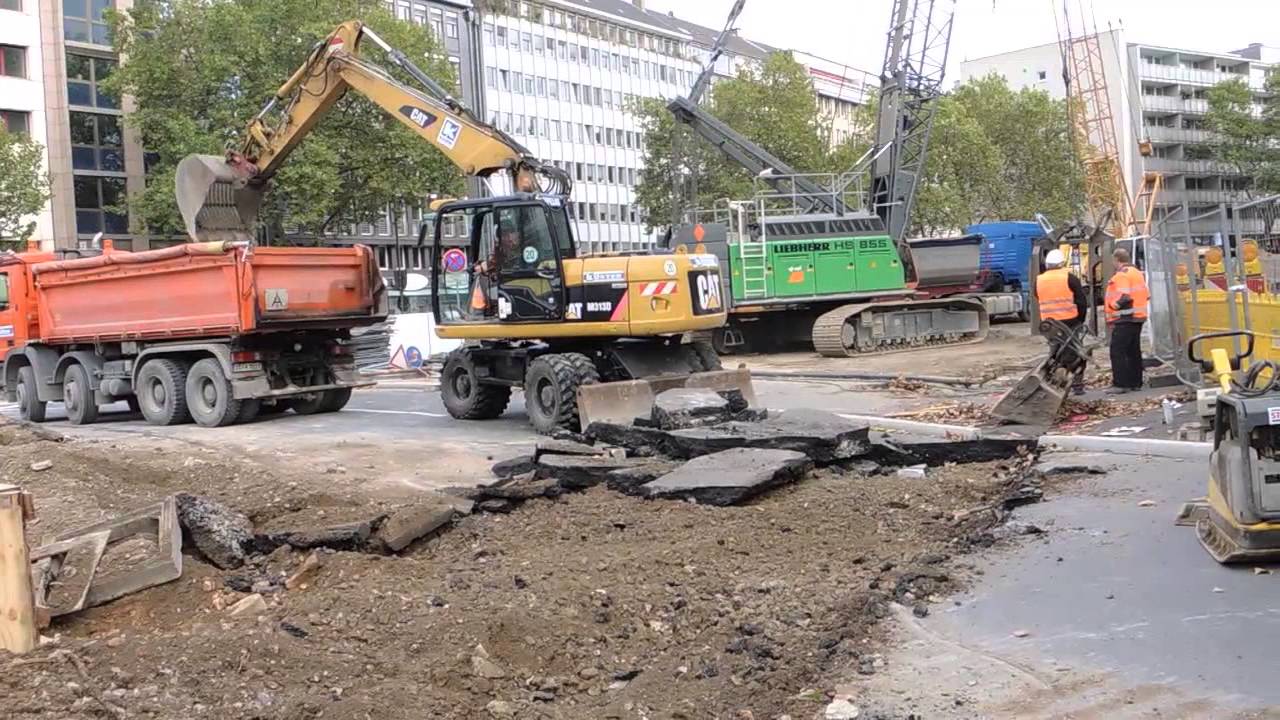 Liebherr HS 855 Caterpillar M313D - YouTube