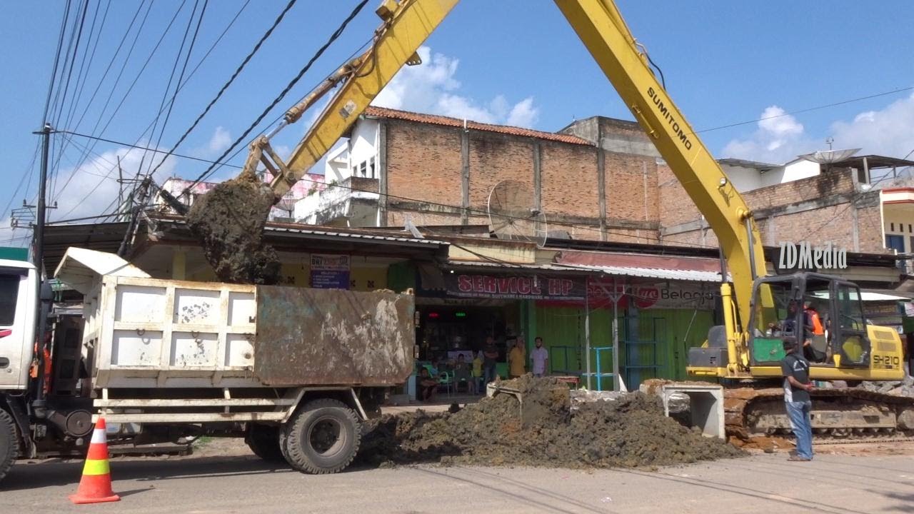 Village Drain System Contructions by Excavator Sumitomo SH210 and Dump ...