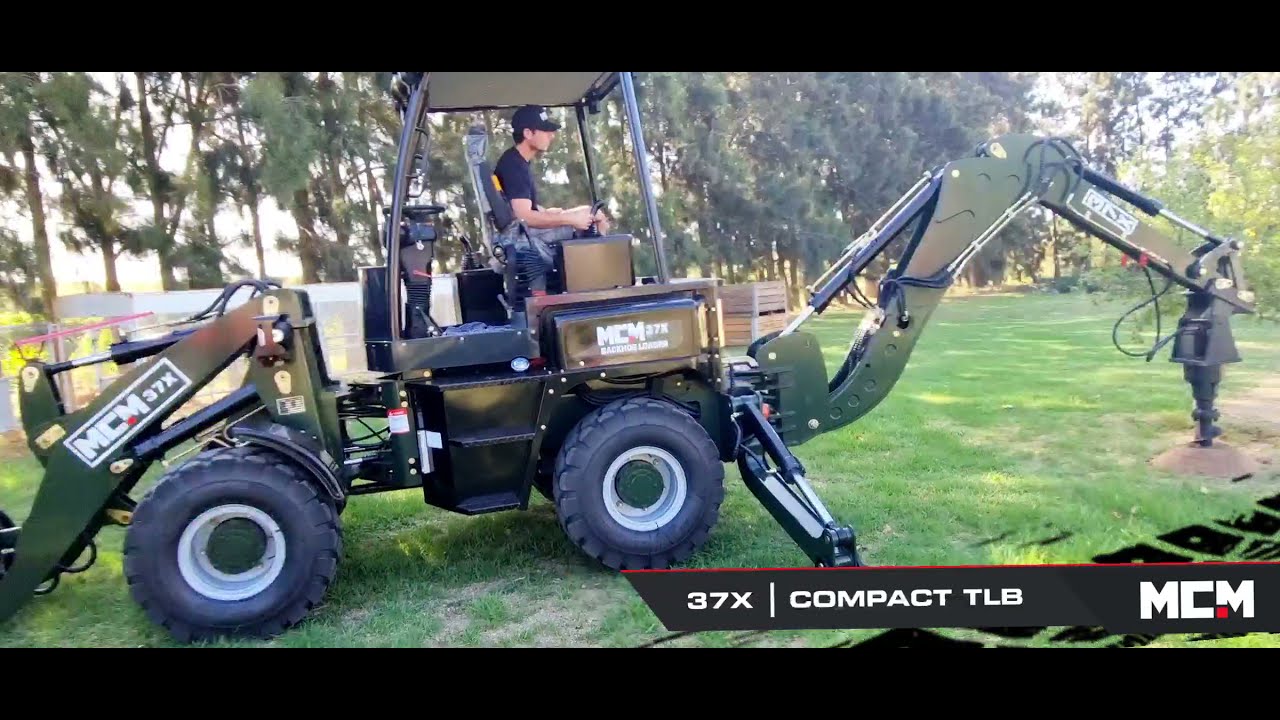 AUGER ATTACHMENT IN ACTION - 37X TLB Drills Holes Easily - YouTube