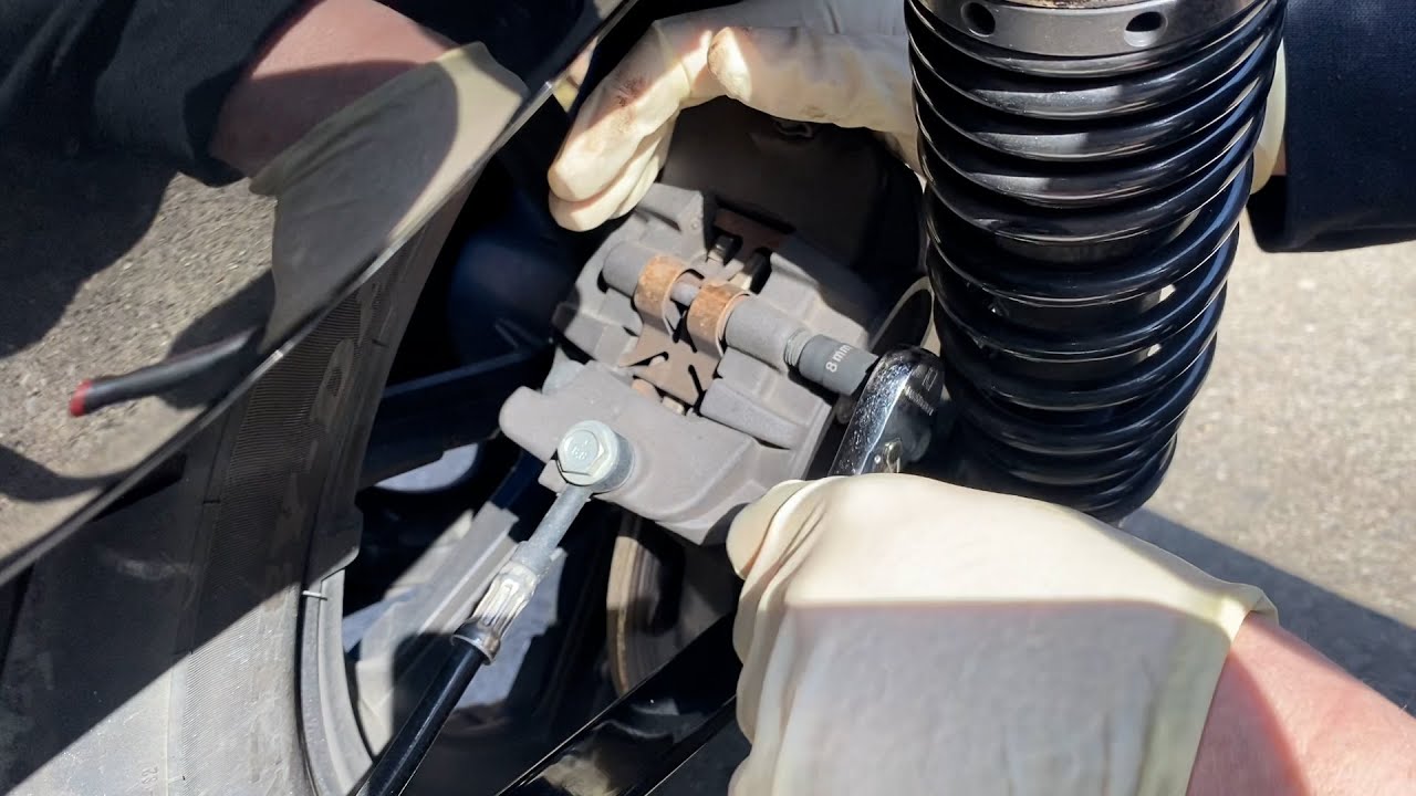 SPORTSTER REAR BRAKE PAD REPLACEMENT - YouTube