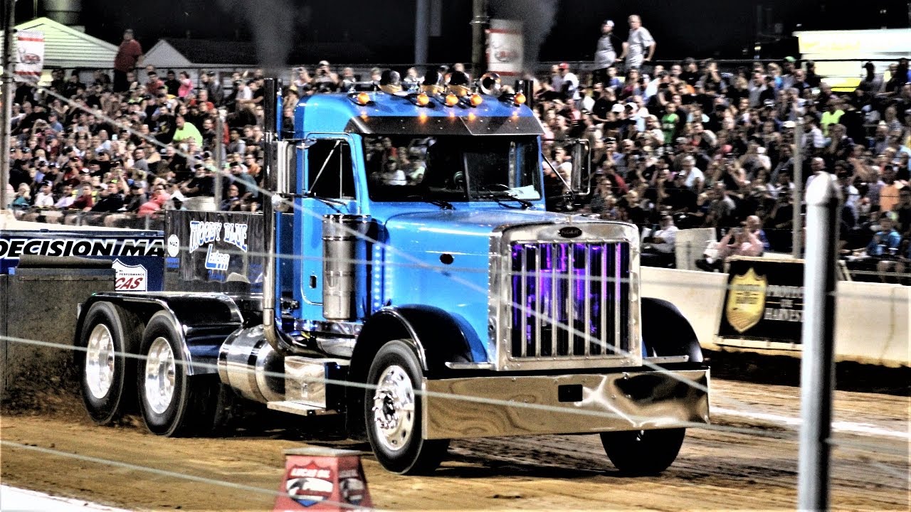 BIG RIG TRUCK PULL.. semi truck pulling a sled on dirt track - YouTube