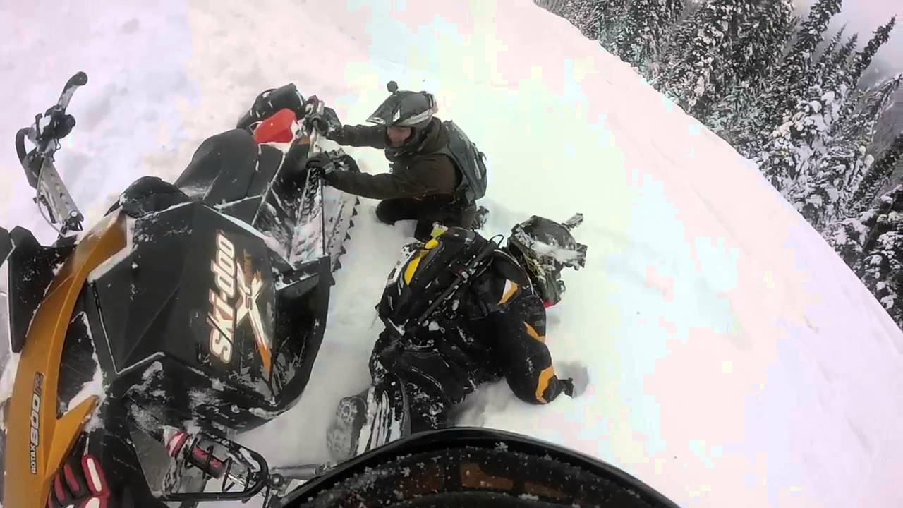 Snowmobiling - Climbing then the epic roll. - YouTube