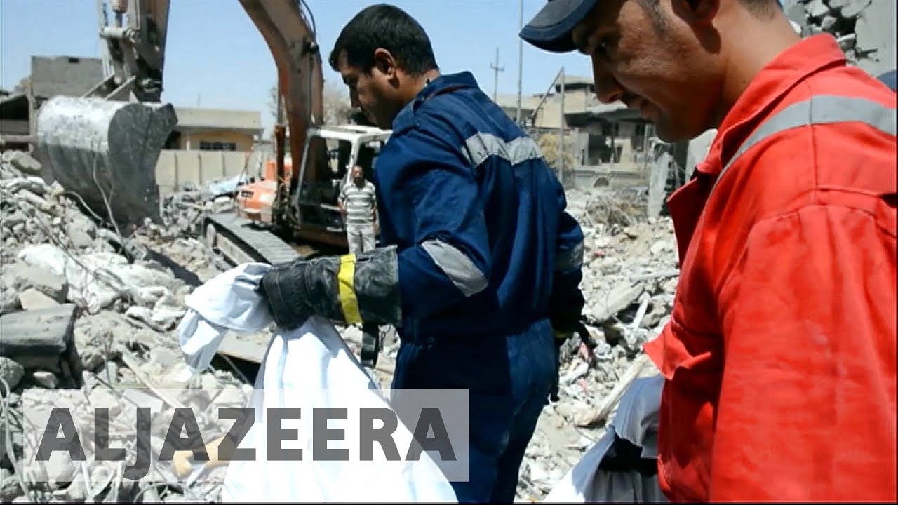 Mosul: Iraqi teams find bodies under rubble - YouTube