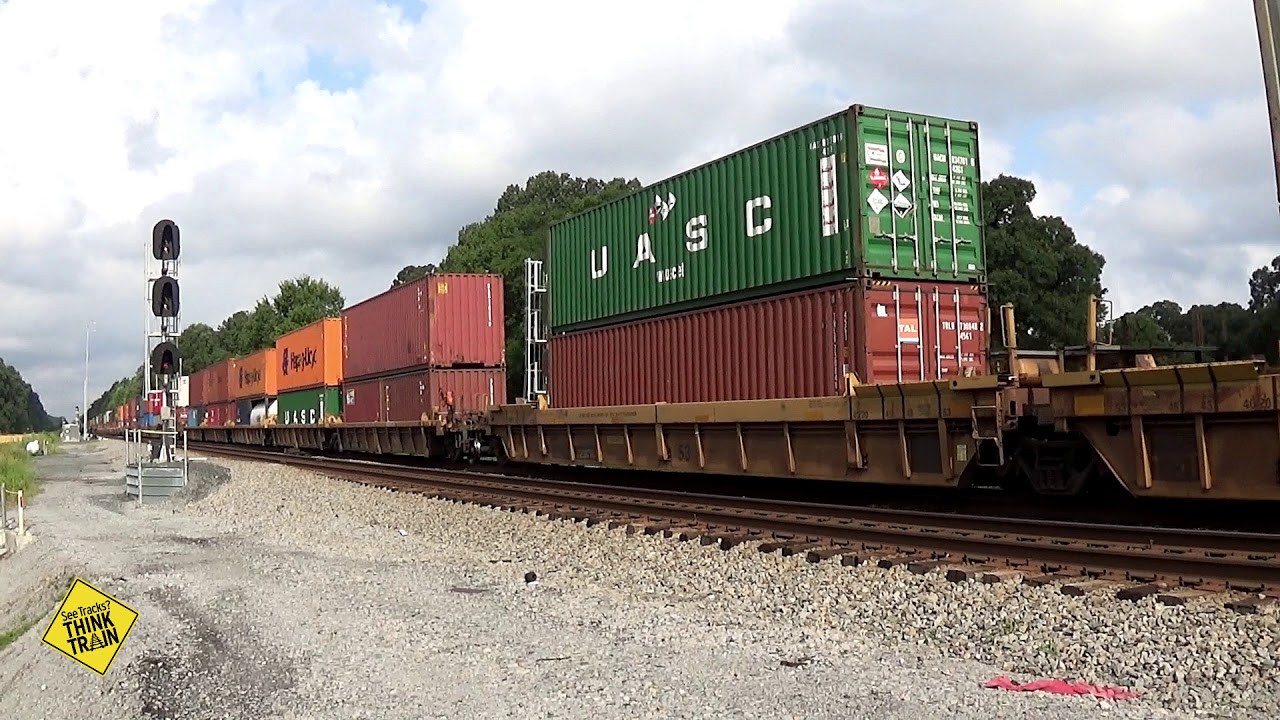 NS 8106 (GE ES44AC) leads NS 23G - YouTube