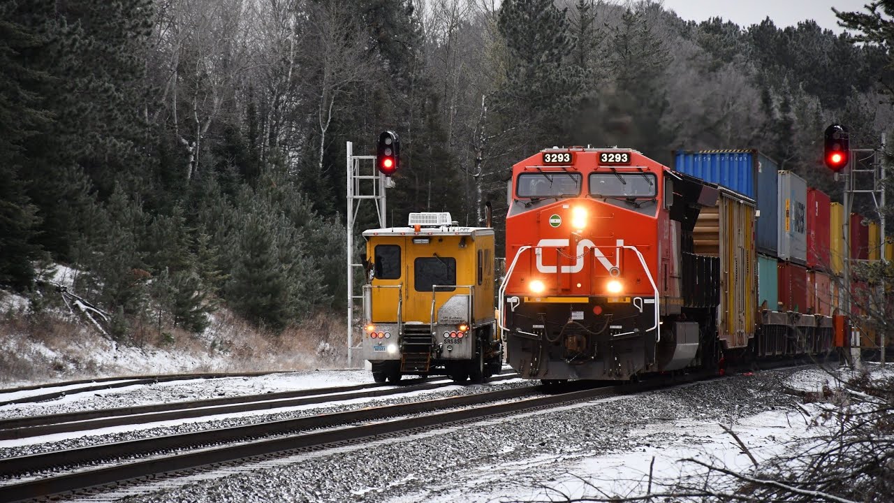 CN Q train with CN (ET44AC) #3293 & CN (ES44AC) (DPU) #2302 Britt ...