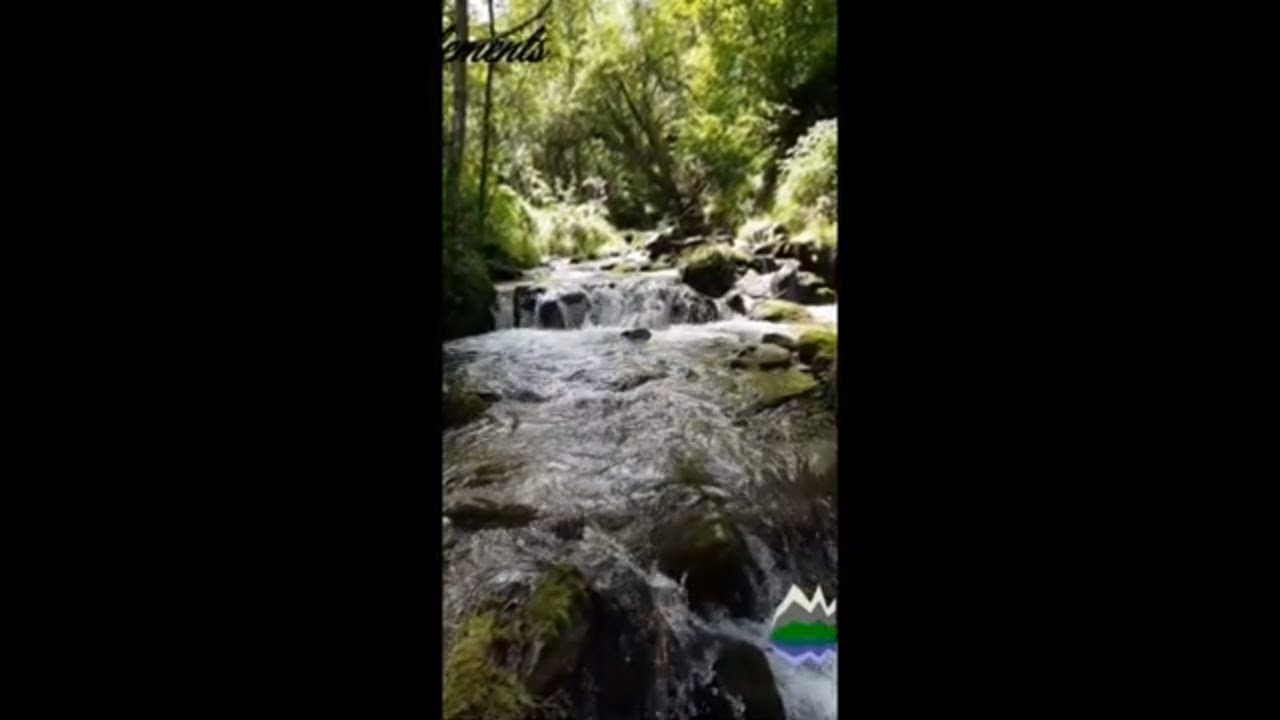 2 hr video of river moving over rocks in slow motion. Hypnotic effect ...