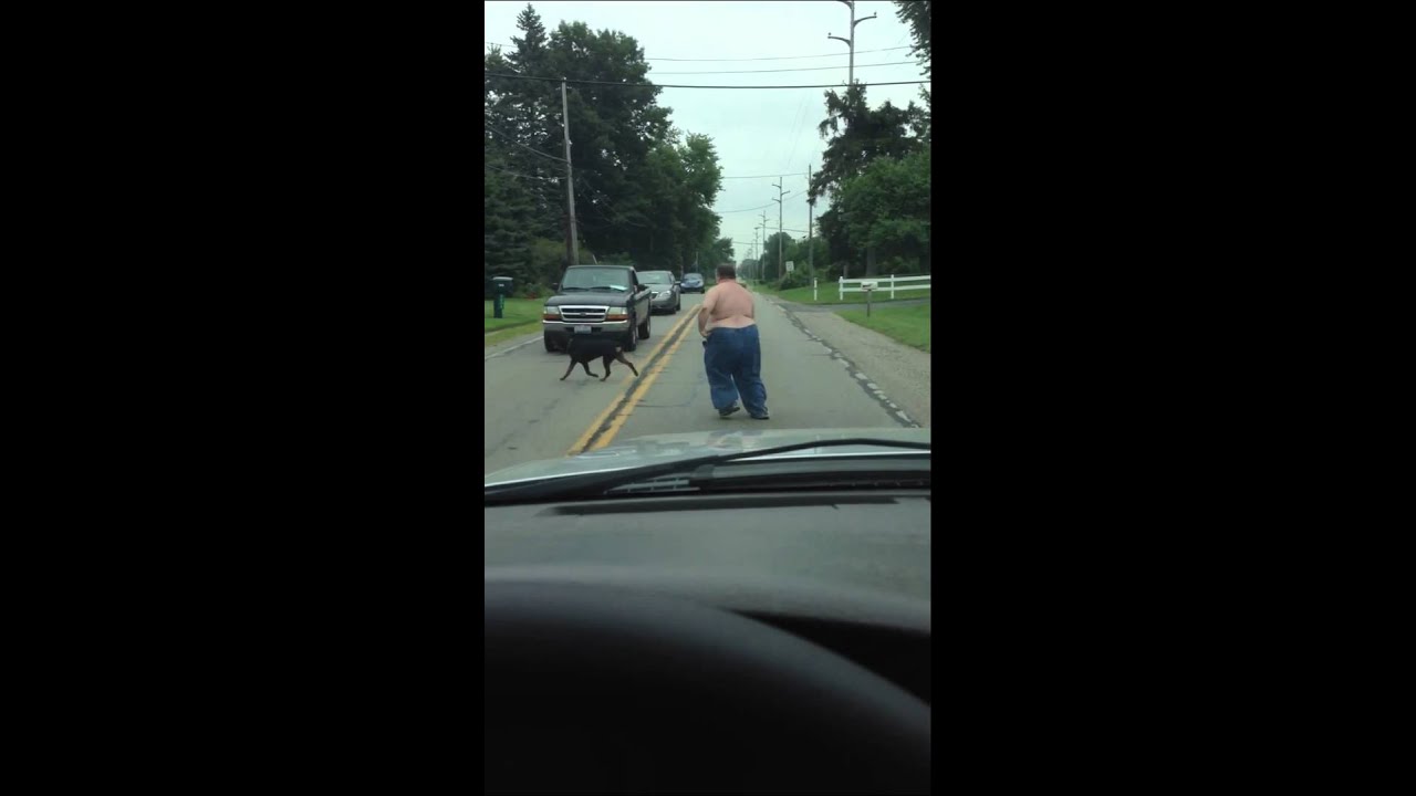 Fat guy chasing dog down street - YouTube