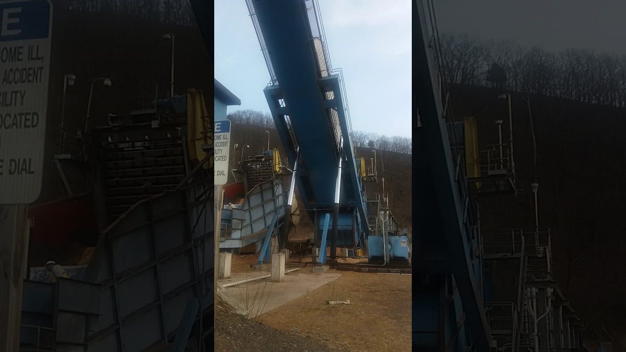 Dumping wood chips at the paper mill in Covington va. - YouTube