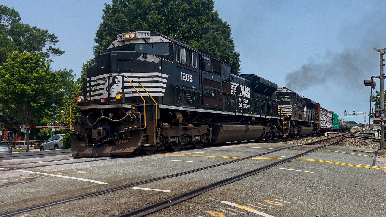 NS 1205 Leads M18-31 through Downtown Greensboro with a Nice Crew - YouTube