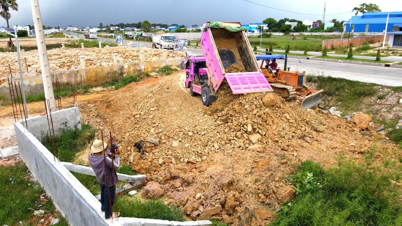 The First Starting new project Land Filling Dozer working push Stone ...