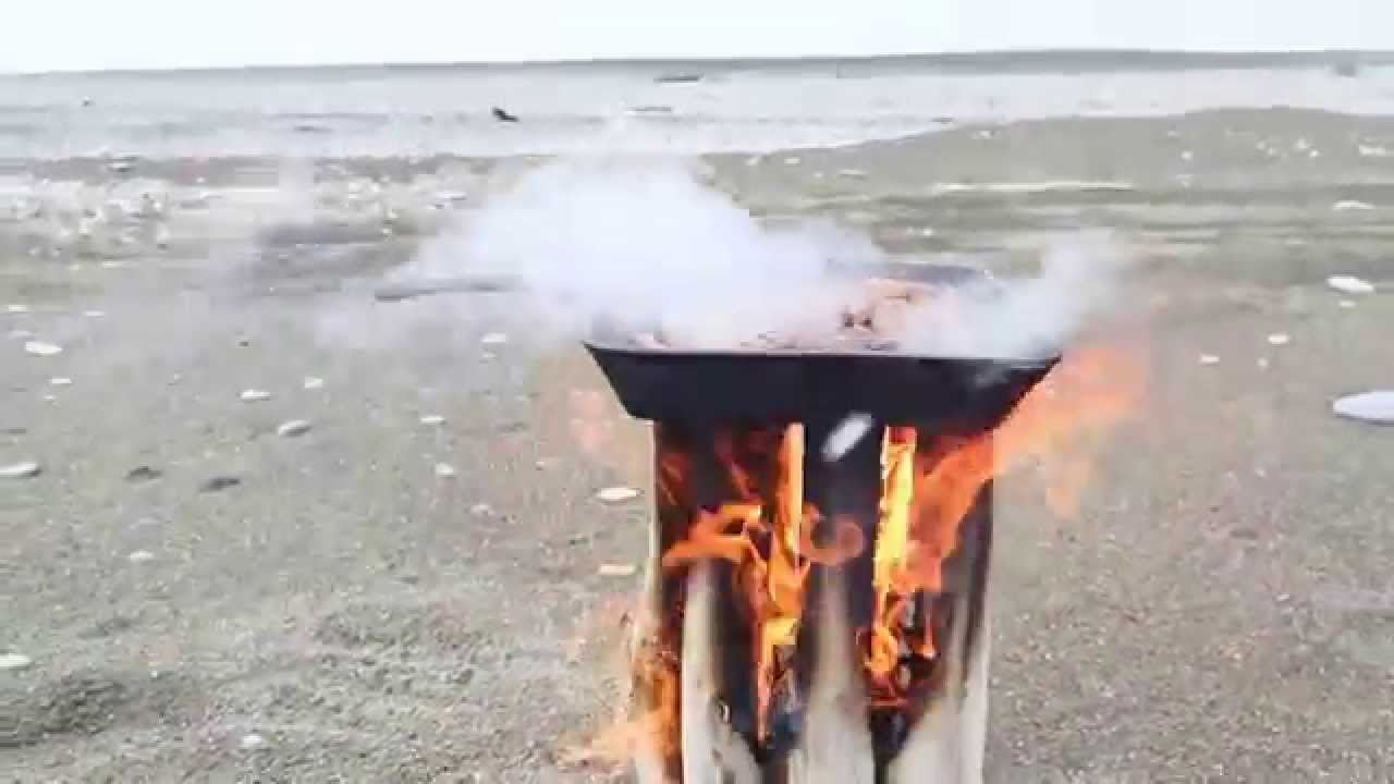 Steak on a stake fire. - YouTube