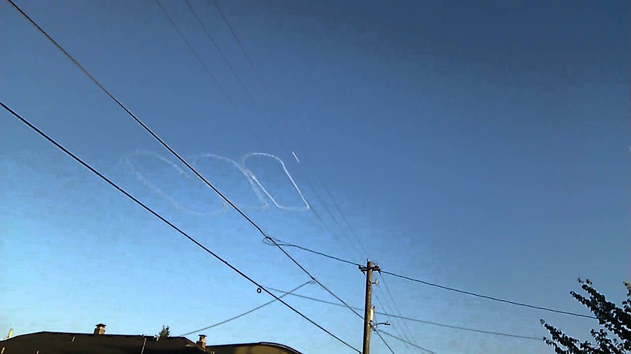 Plane Writing in the sky - YouTube