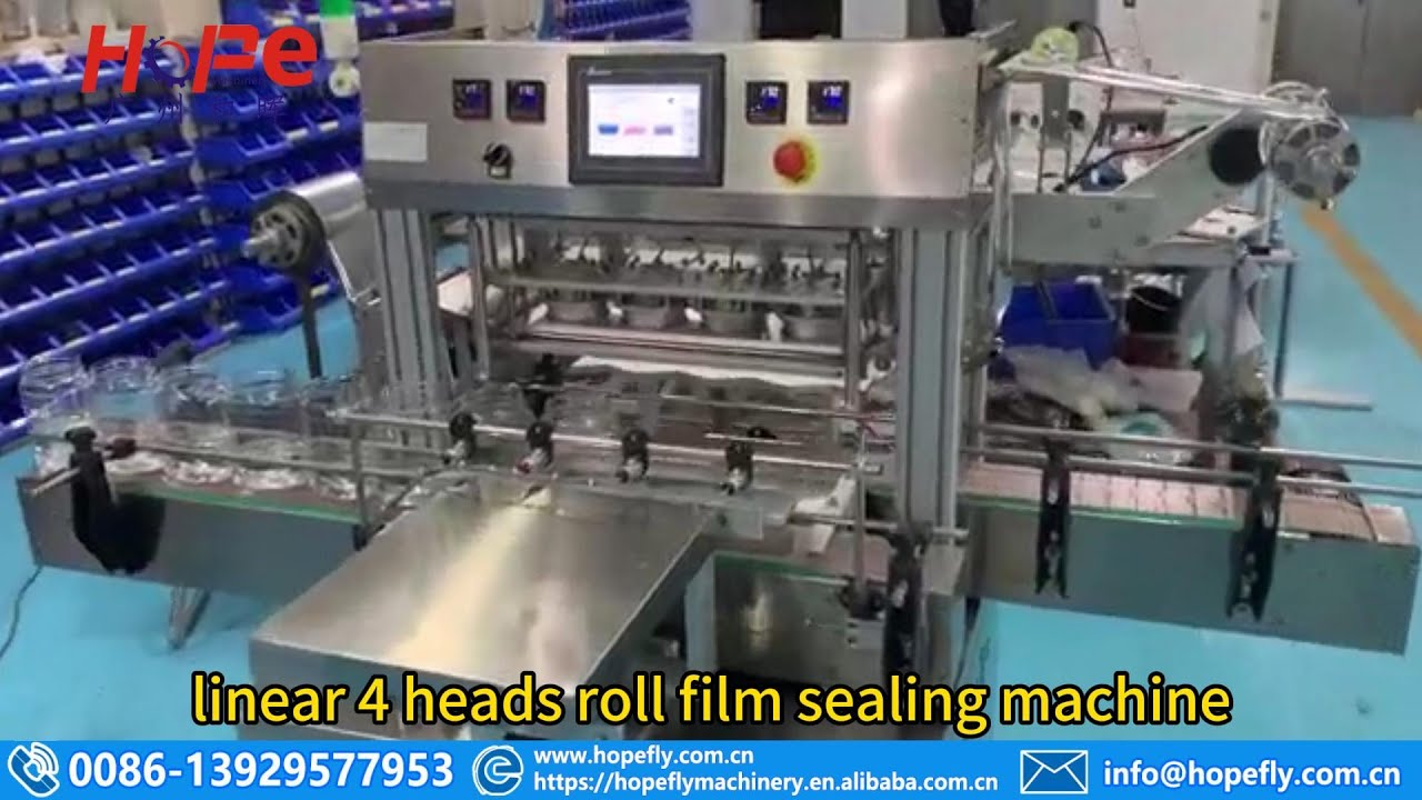 linear 4 heads roll film sealing machine - YouTube