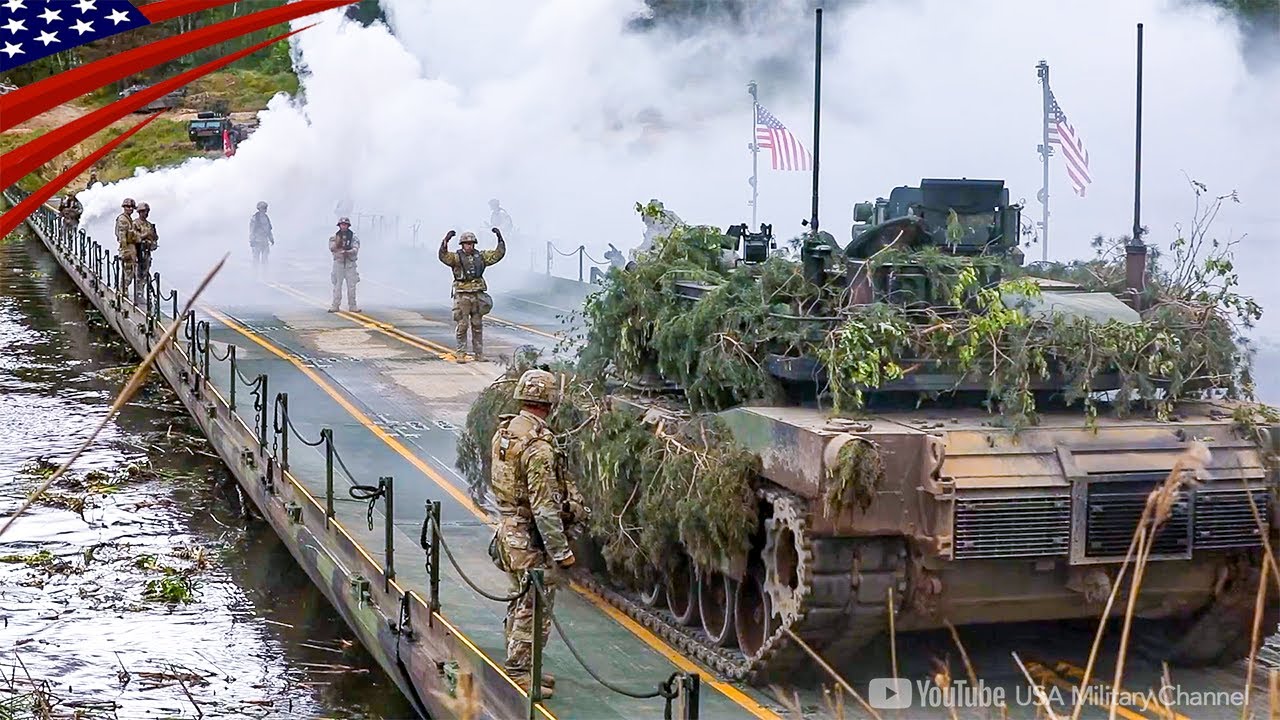 Polish M1A2 Abrams Tanks Across River on US Pontoon Bridge - YouTube