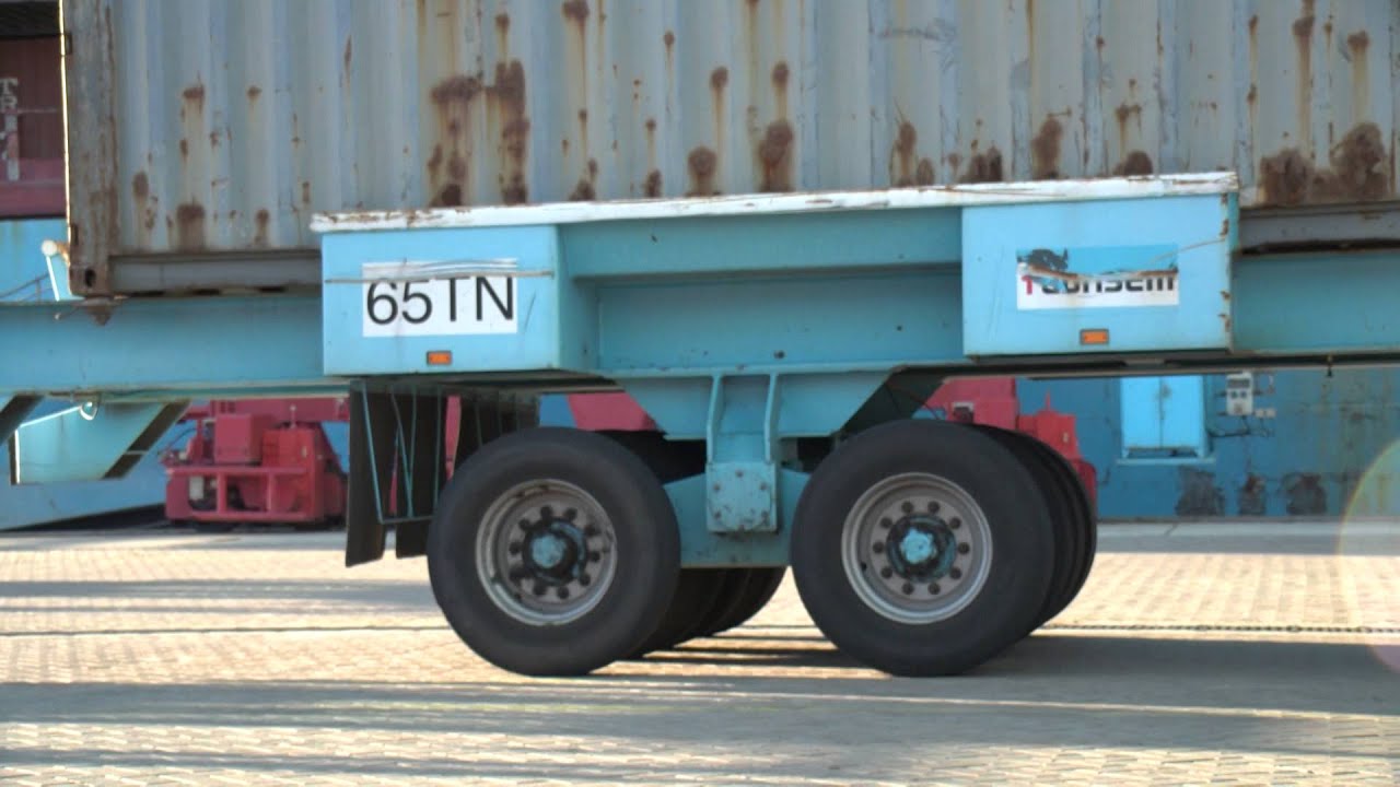 Our experts in operations: Straddle carier & Truck driver - YouTube