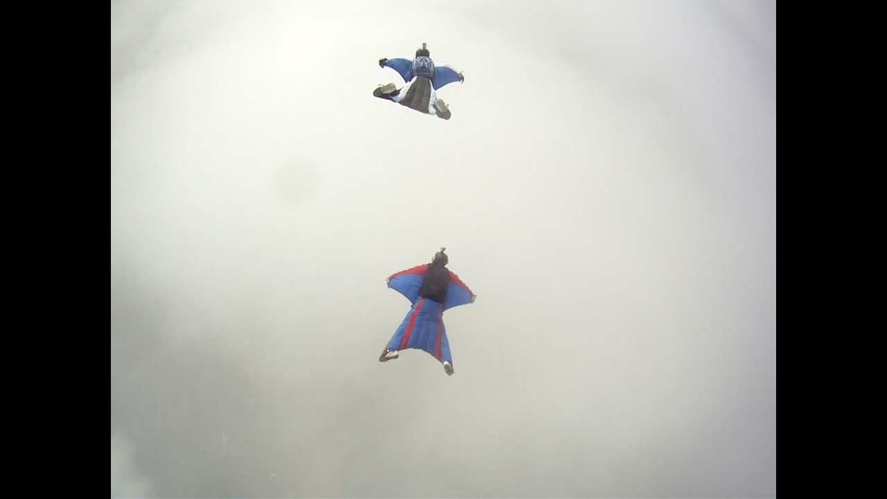 Unique Skydive - Wingsuiting Warp Speed through the Rain - YouTube