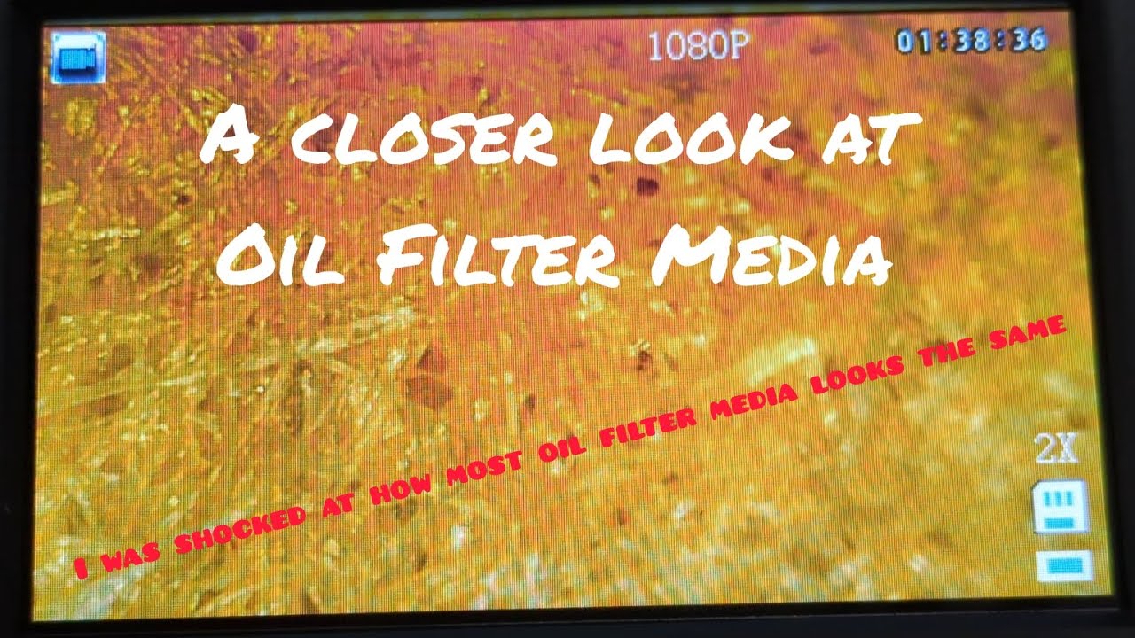 Oil filter media looked at 800x closer - YouTube