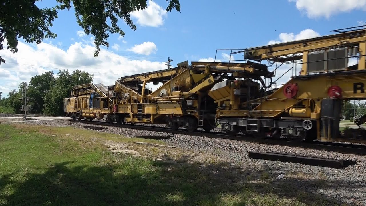 BALLAST UNDERCUTTER ROLL BY AND TRAIN TRAFFIC ON THE UNION PACIFIC ...