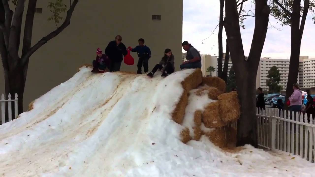 Kids sliding down a snow hill - YouTube