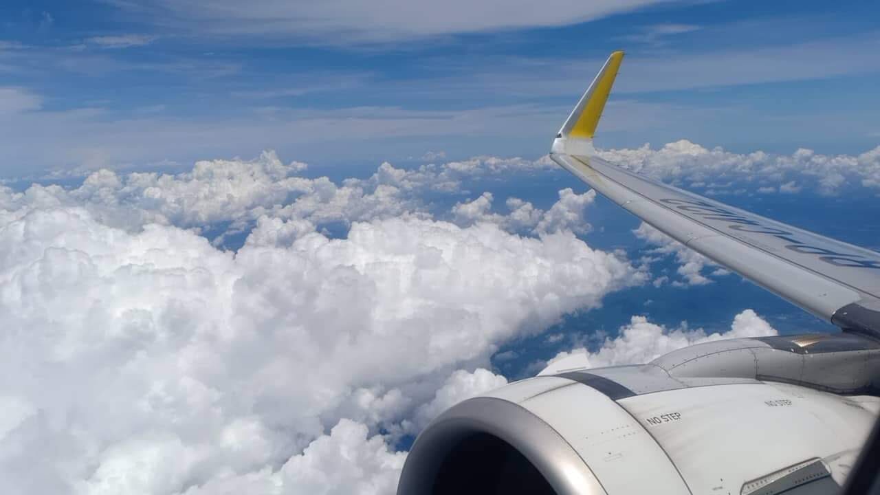 Flying above the beautiful clouds / view airplane window - YouTube