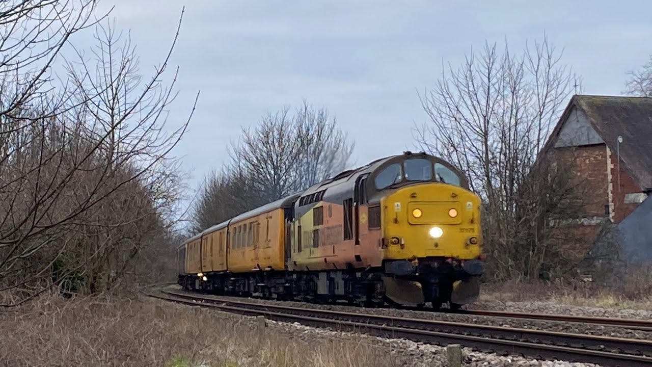 37175 3Q55 with DBSO 9702 on tow cruises along the Central line over ...