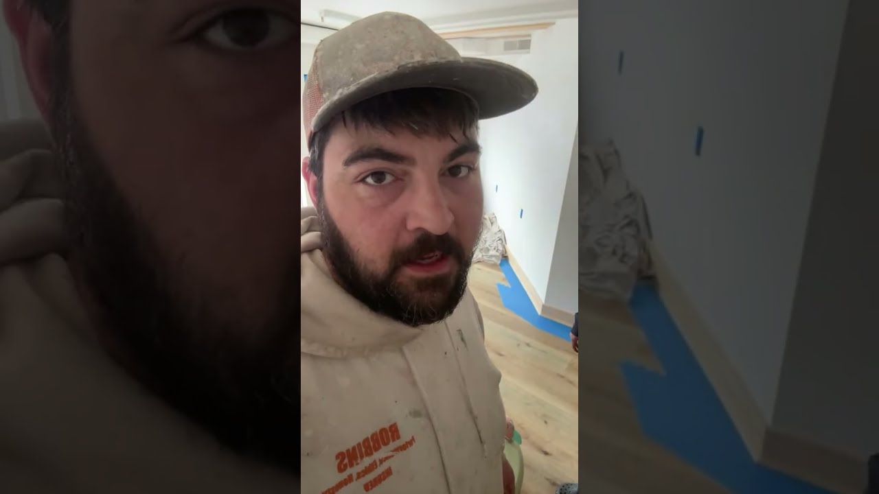 Laying drop cloths spraying smart primer on all ceilings walls doors ...