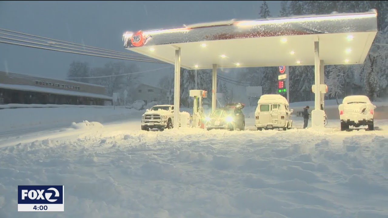 Record snow in the Sierra closes roads, ski resorts - YouTube