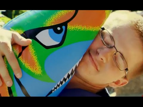 Guy loves inflatable animals - YouTube