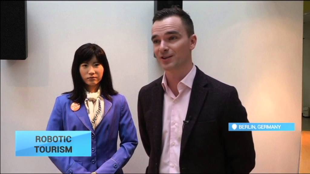 Robotic Tourism: Robots shake up check-in at Berlin travel fair - YouTube