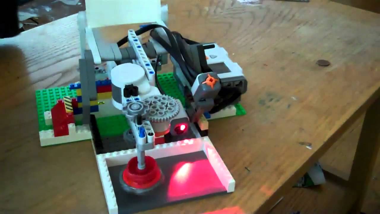 NXT Lego Robot Beyblade Top Laucher 2011 Science Project - YouTube