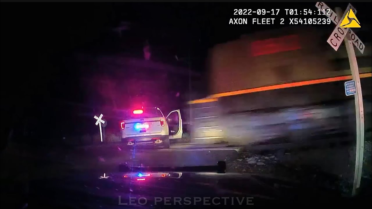 Freight Train Slams Into Police Car With Handcuffed Woman Inside - YouTube