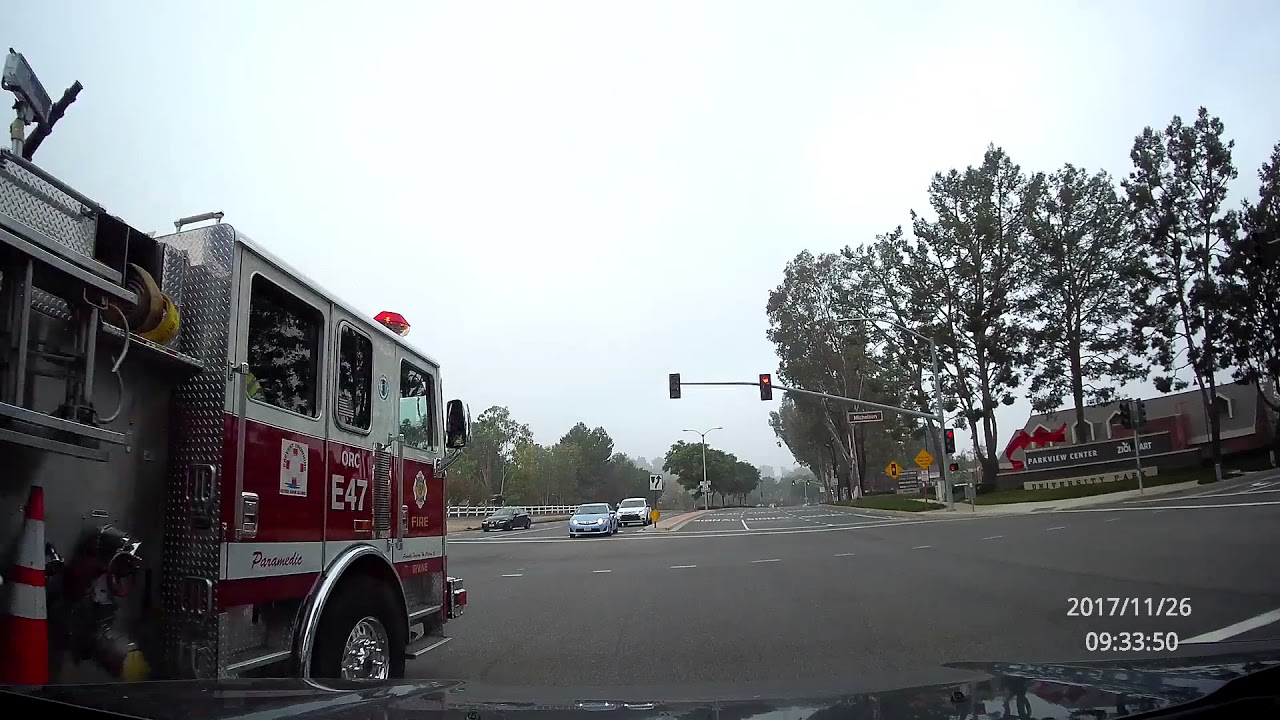 Fire Engine and Police Car Busting Through a Red Light - YouTube