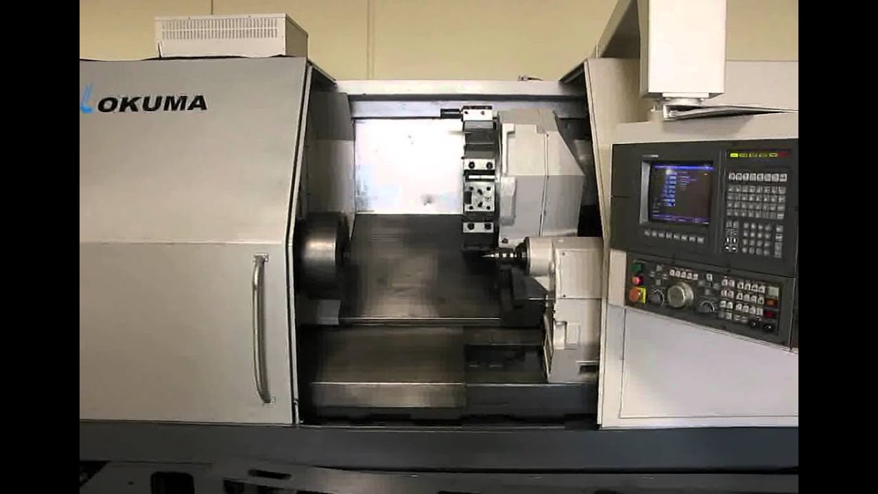 Okuma LB-35 II W/ OSP-7000 15" chuck,Tailstock,Chip Conveyor "Video ...