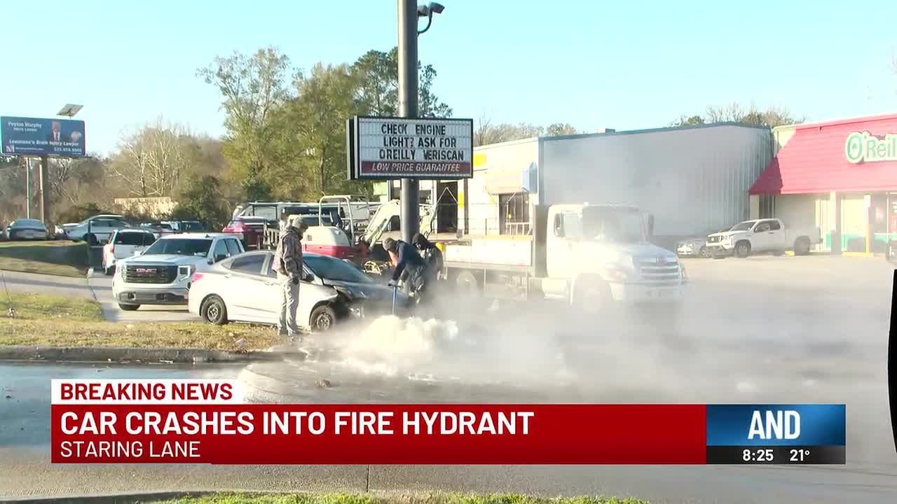 Car crashes into fire hydrant on Staring Lane in front of auto parts ...