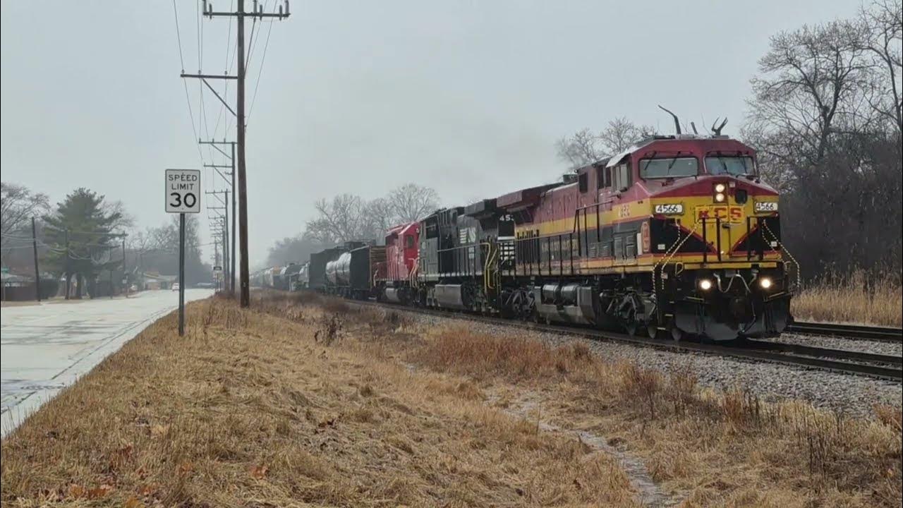 KCSM/NS AC44s, CP SD40-3 on CPKC 2-246 in pouring rain at Morton Grove - YouTube