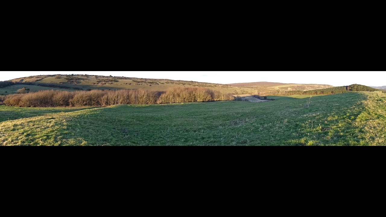 The ancient fortification at Castle Hill near the Longstone Mottistone ...