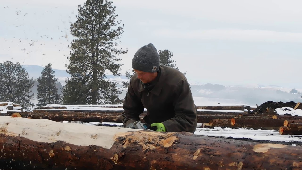 Peeling logs with a planer (Clearwater Log Homes and Structures) - YouTube