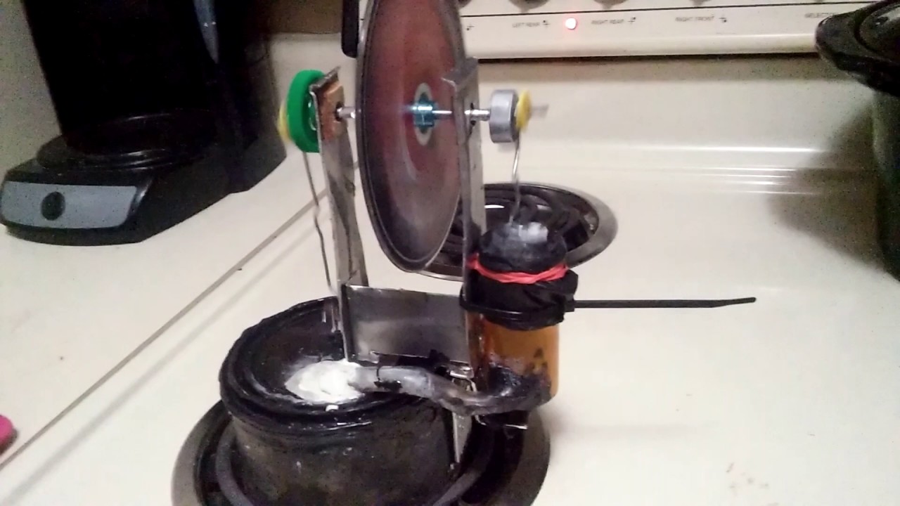 Stirling Engine with metal displacer - YouTube