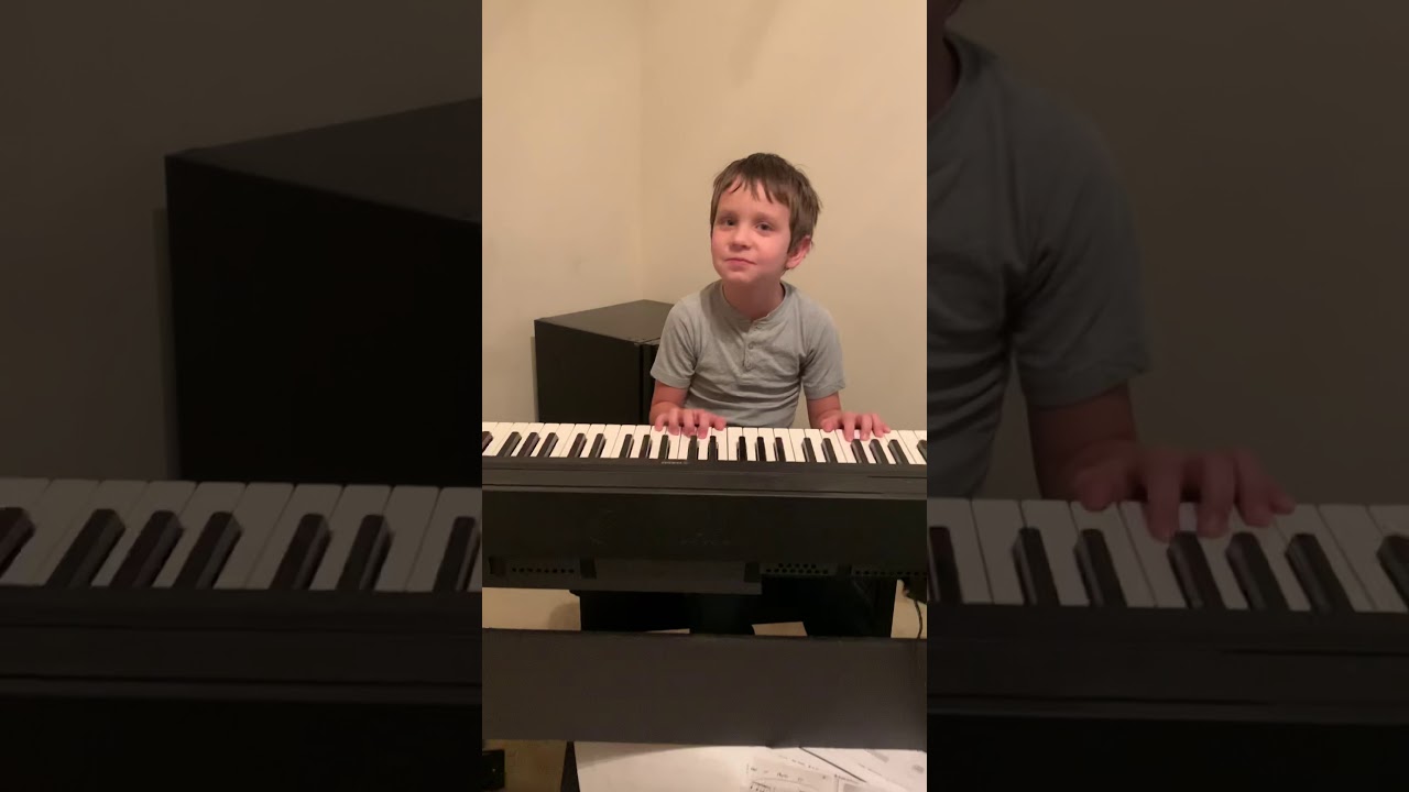 Sam starts learning piano - YouTube