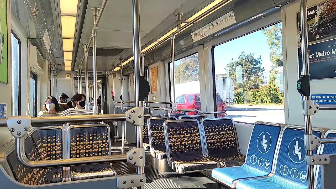 Riding the Metro Gold Line in the middle of the Interstate 210 Freeway ...