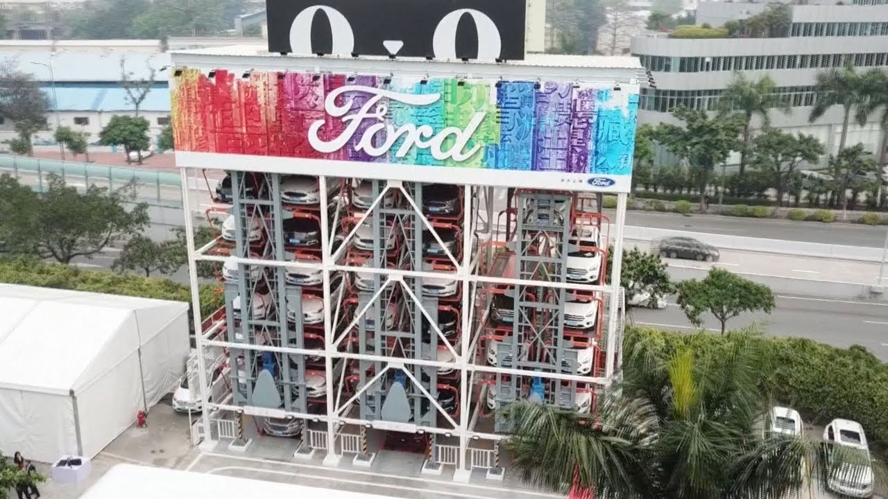 Alibaba launches car vending machine in Guangzhou, south China - YouTube