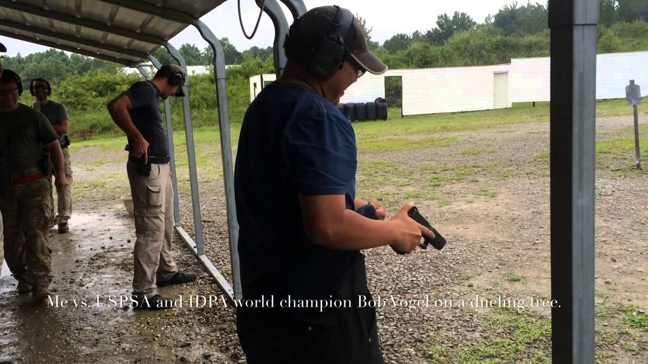 Me vs. USPSA and IDPA World Champion Bob Vogel on a dueling tree - YouTube