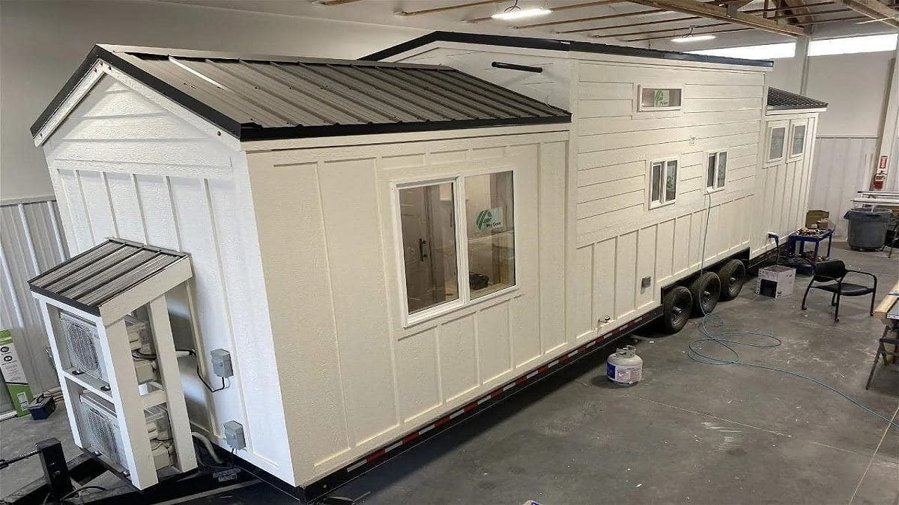 Mountain Tiny Homes Caboose – 32 feet of modern, cozy living ...