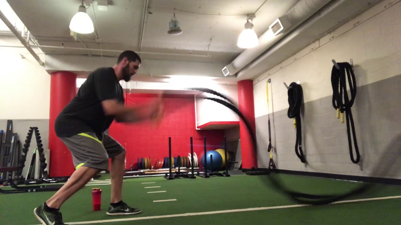 Split stance double hand battle rope waves - YouTube