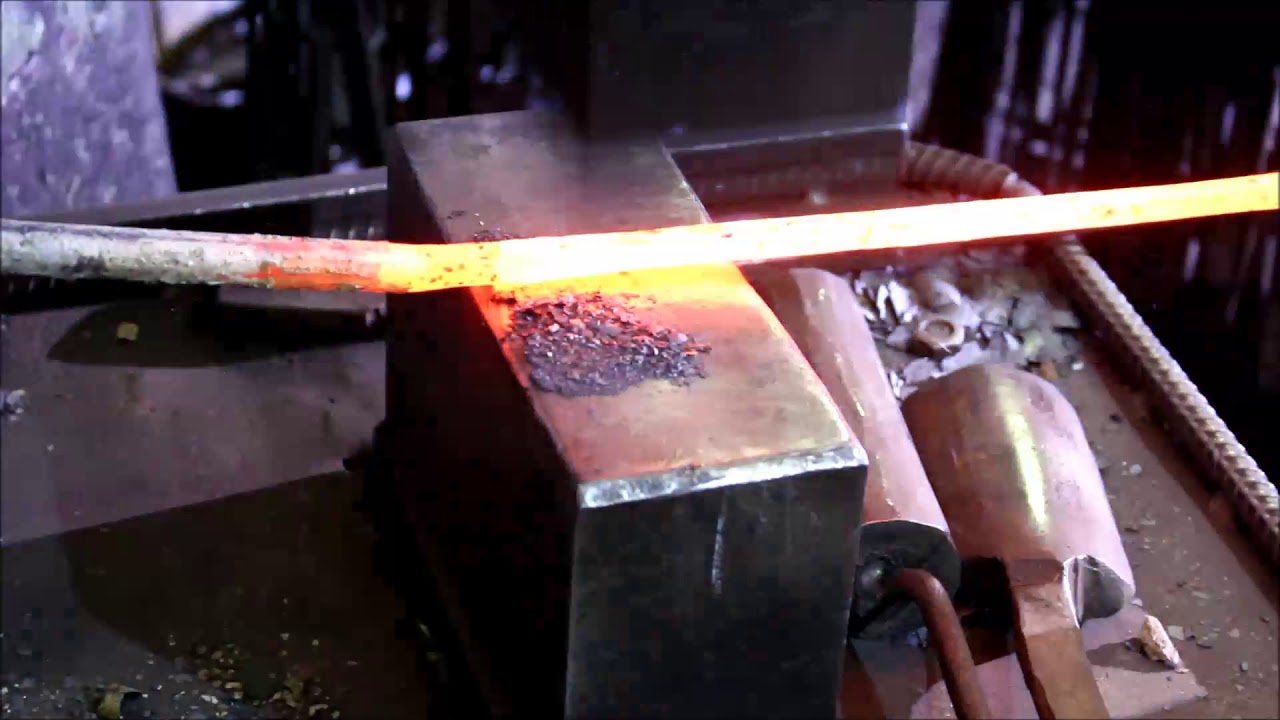 Blacksmithing. Forging a fire poker - YouTube