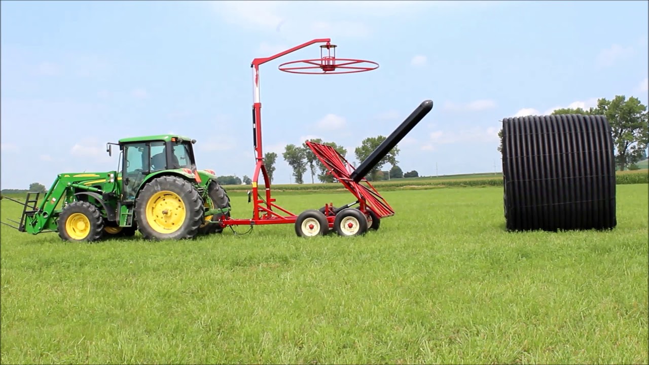 Auto Hat Picking up Timewell Drainage Tile - YouTube