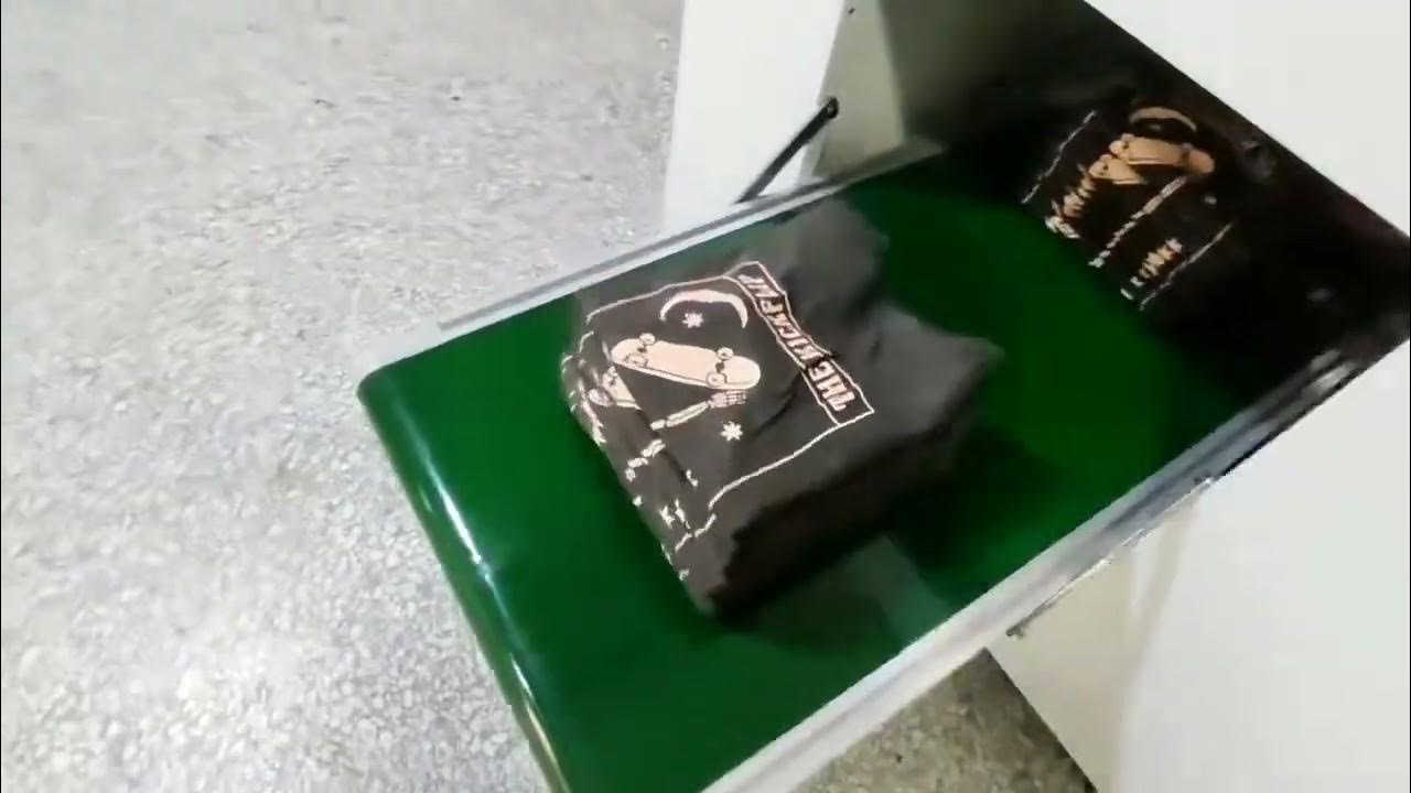 FPS -2 Automatic clothes folding machine with coveyor at apparel ...